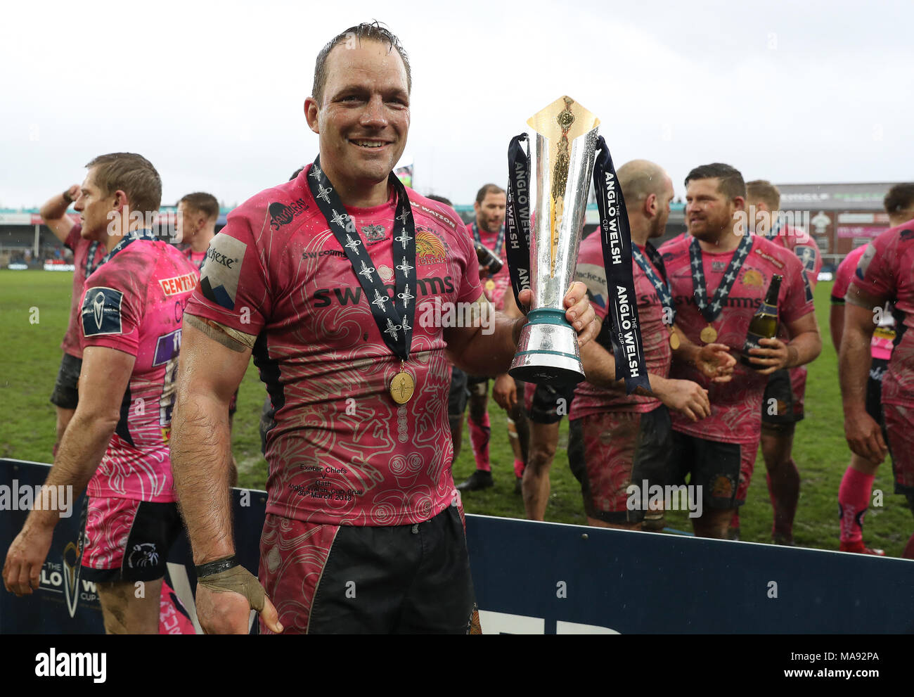 Exeter captain Kai Horstmann lifts the trophy after victory over Bath ...