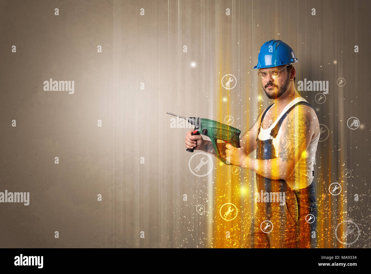 Manual worker with wrench symbols and tool Stock Photo - Alamy