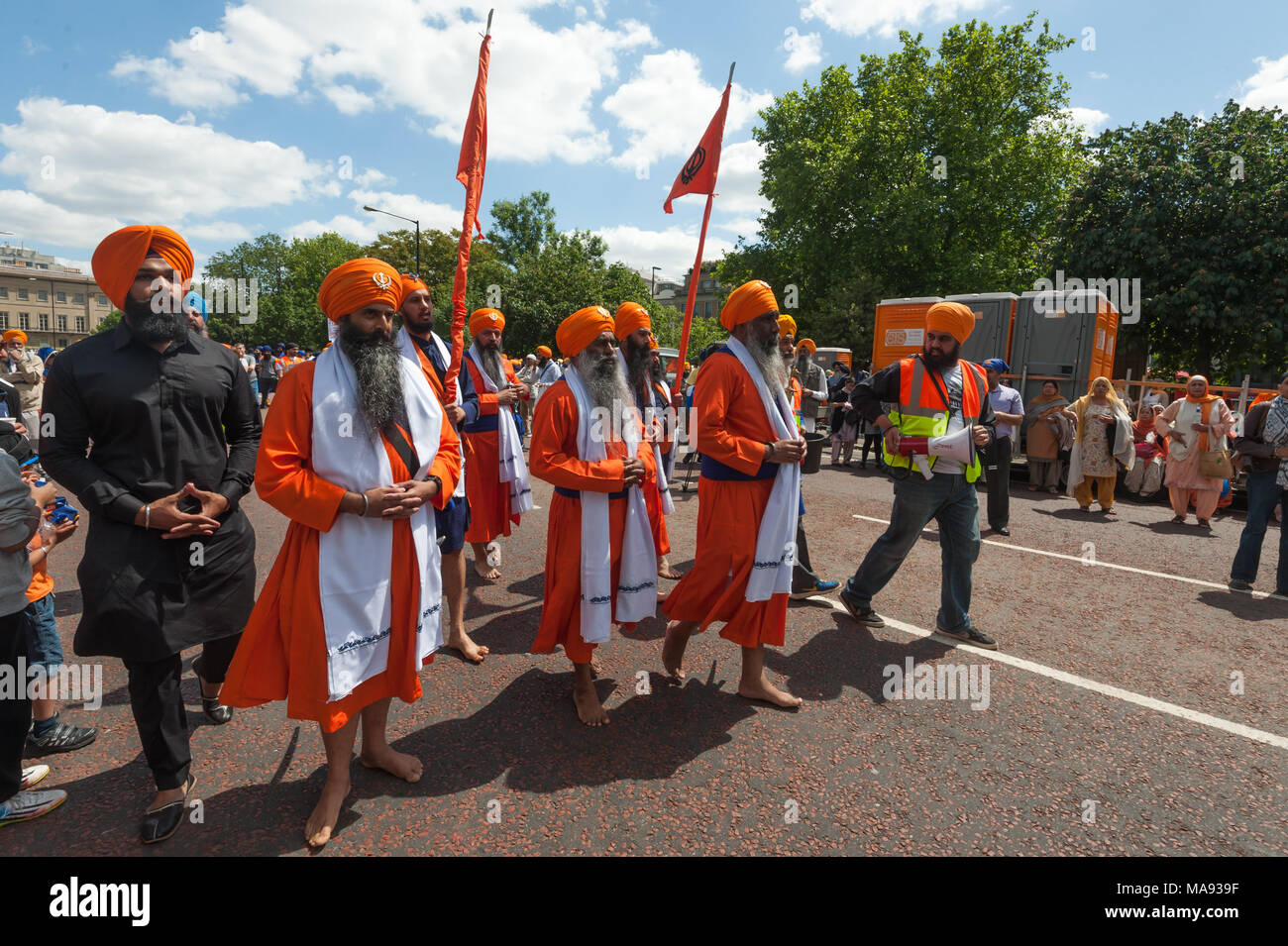 Five Khalsa representing the Blessed Ones along with two bearingthe ...