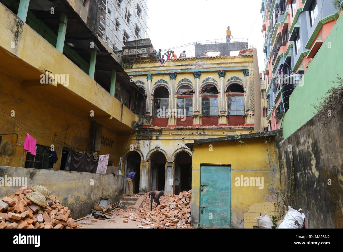 Dhaka 17 march 2018. worker hammering the roof of a heritage building ...