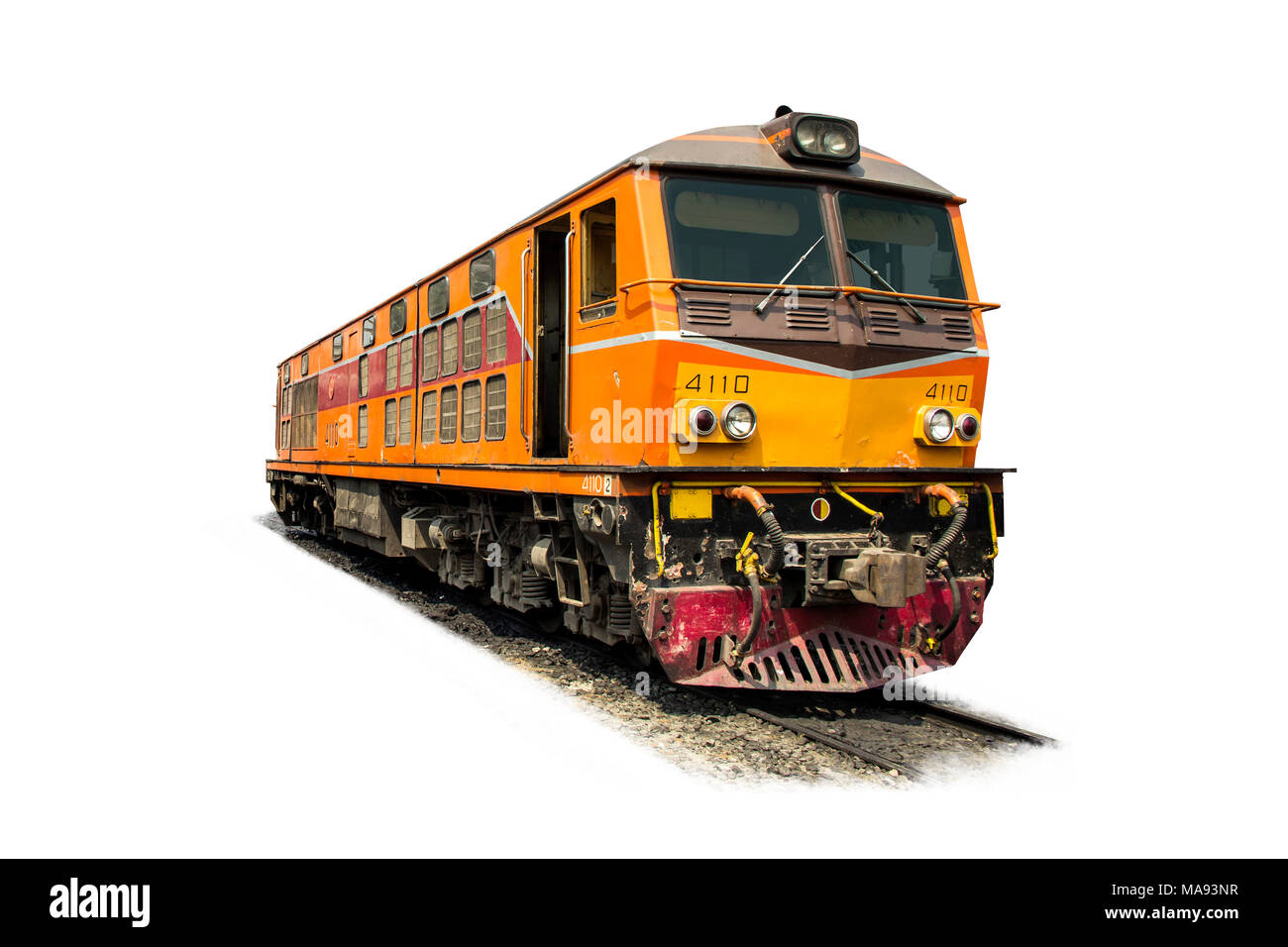 Yellow and Orange Train diesel electric locomotive on the tracks from ...