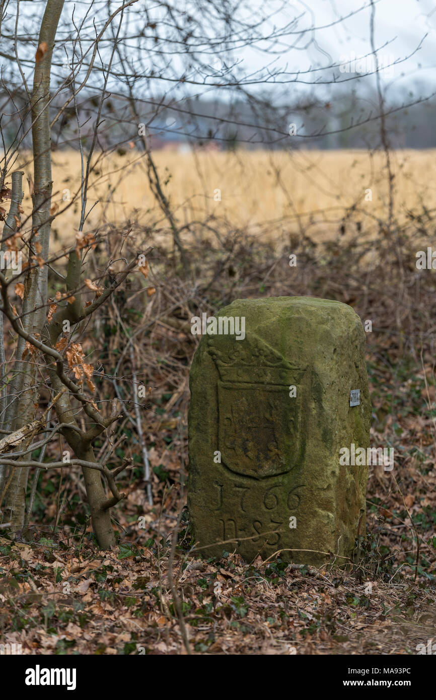 Historical boundary stone on the land border of Netherlands and Germany ...