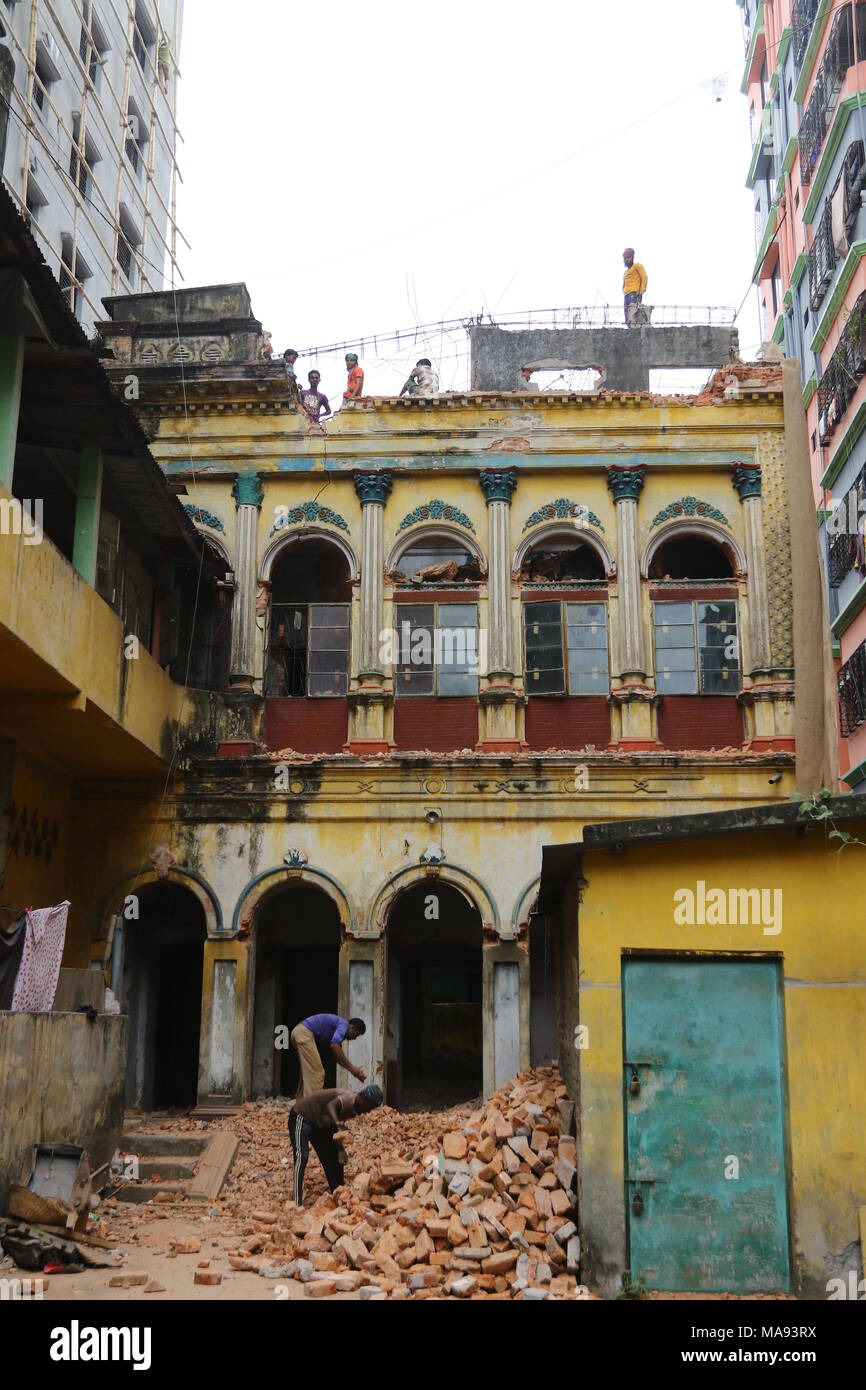 Dhaka 17 march 2018. worker hammering the roof of a heritage building ...