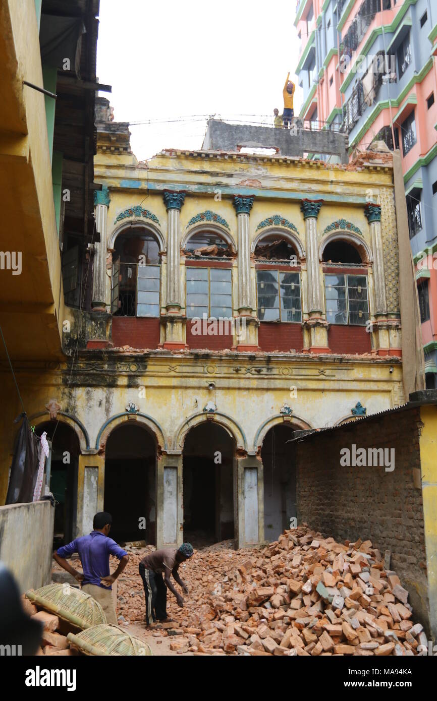 Dhaka 17 march 2018. worker hammering the roof of a heritage building ...