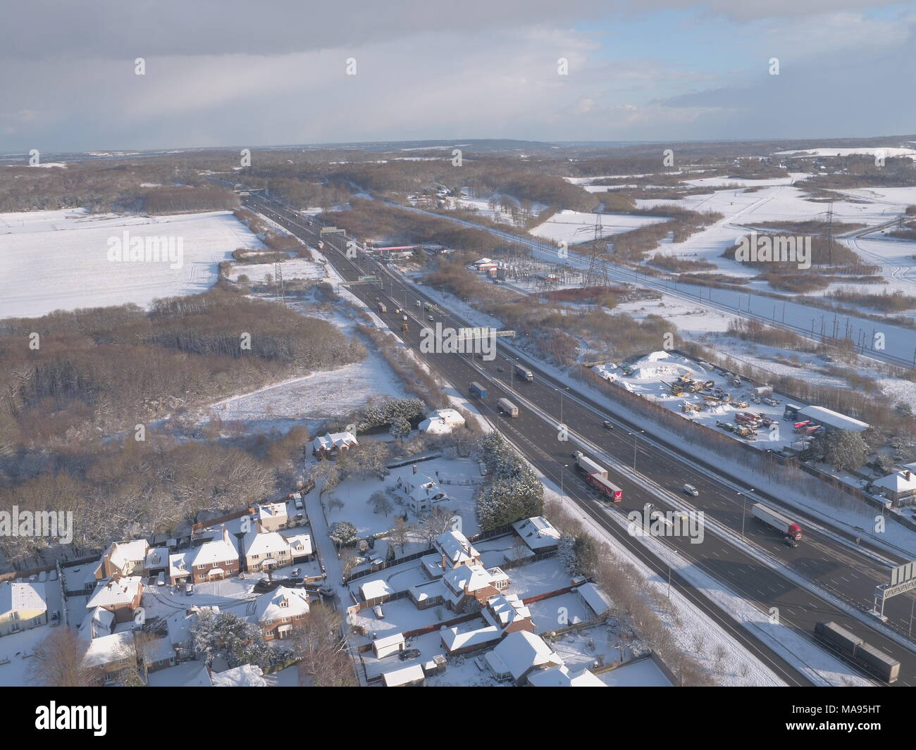 Aerial images taken by drone show the snow covering the landscape at ...