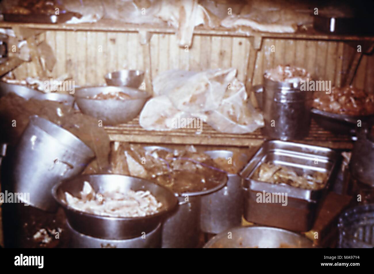 Photograph of a storage area in the kitchen of a migrant labor work ...