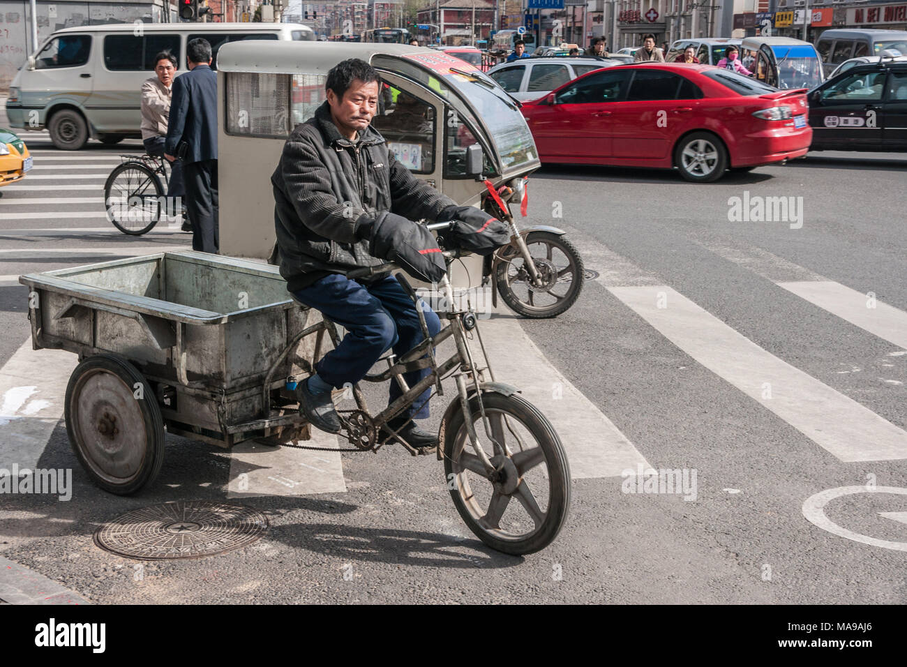 Beijing, China - April 26, 2010: Closeup of gray, freight tricycle on ...