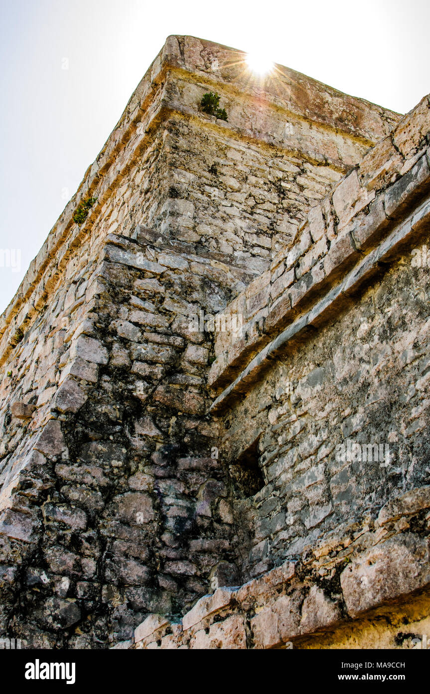 Sun rising over a Mayan pyramid ruin in stones in Tulum Mexico Stock ...
