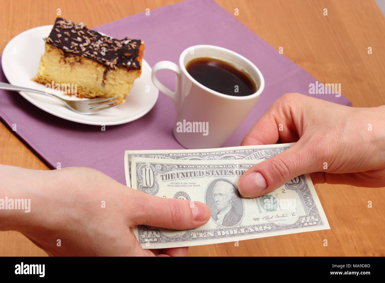 Paying for food in cafe or restaurant, cheesecake and coffee, polish ...