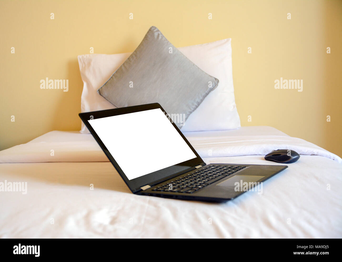 blank screen laptop on bed, computer note book color black Stock Photo ...