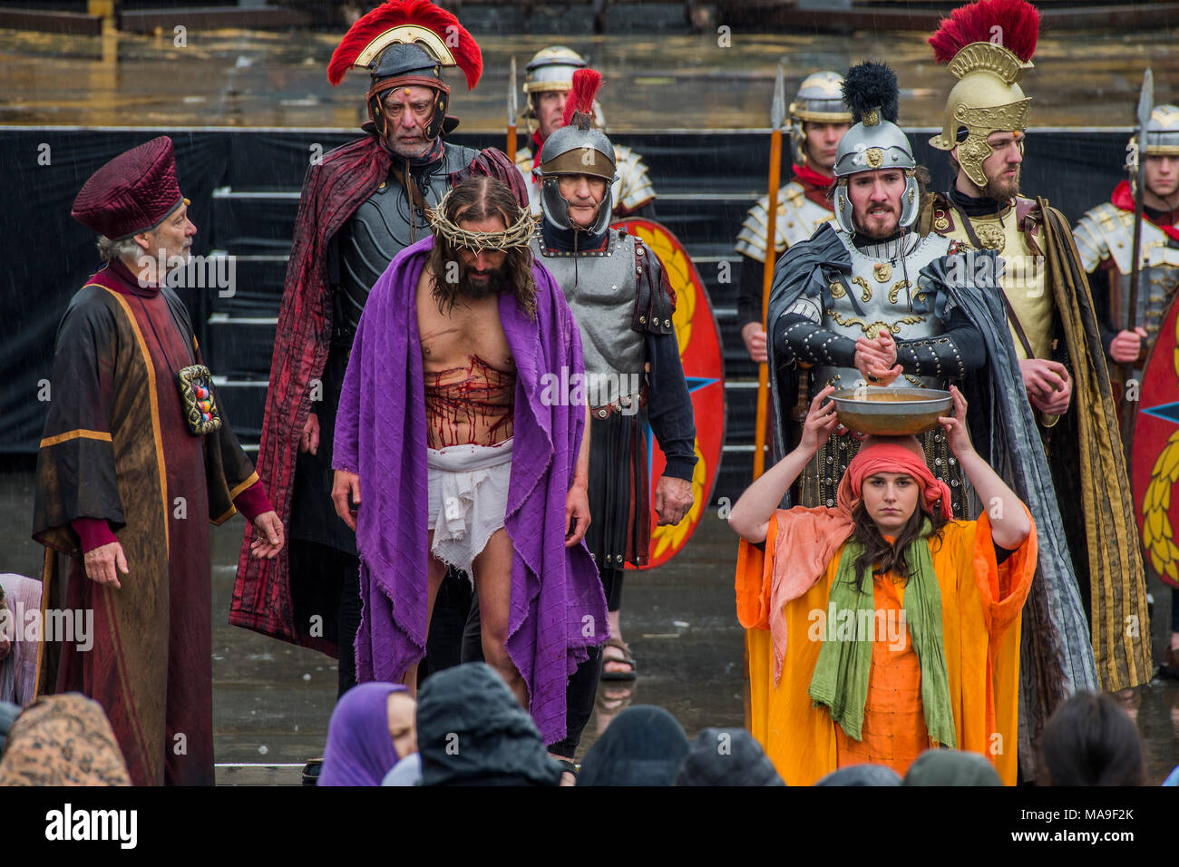 London, UK. 30th March, 2018. Pontious Pilot washes his hands of the ...