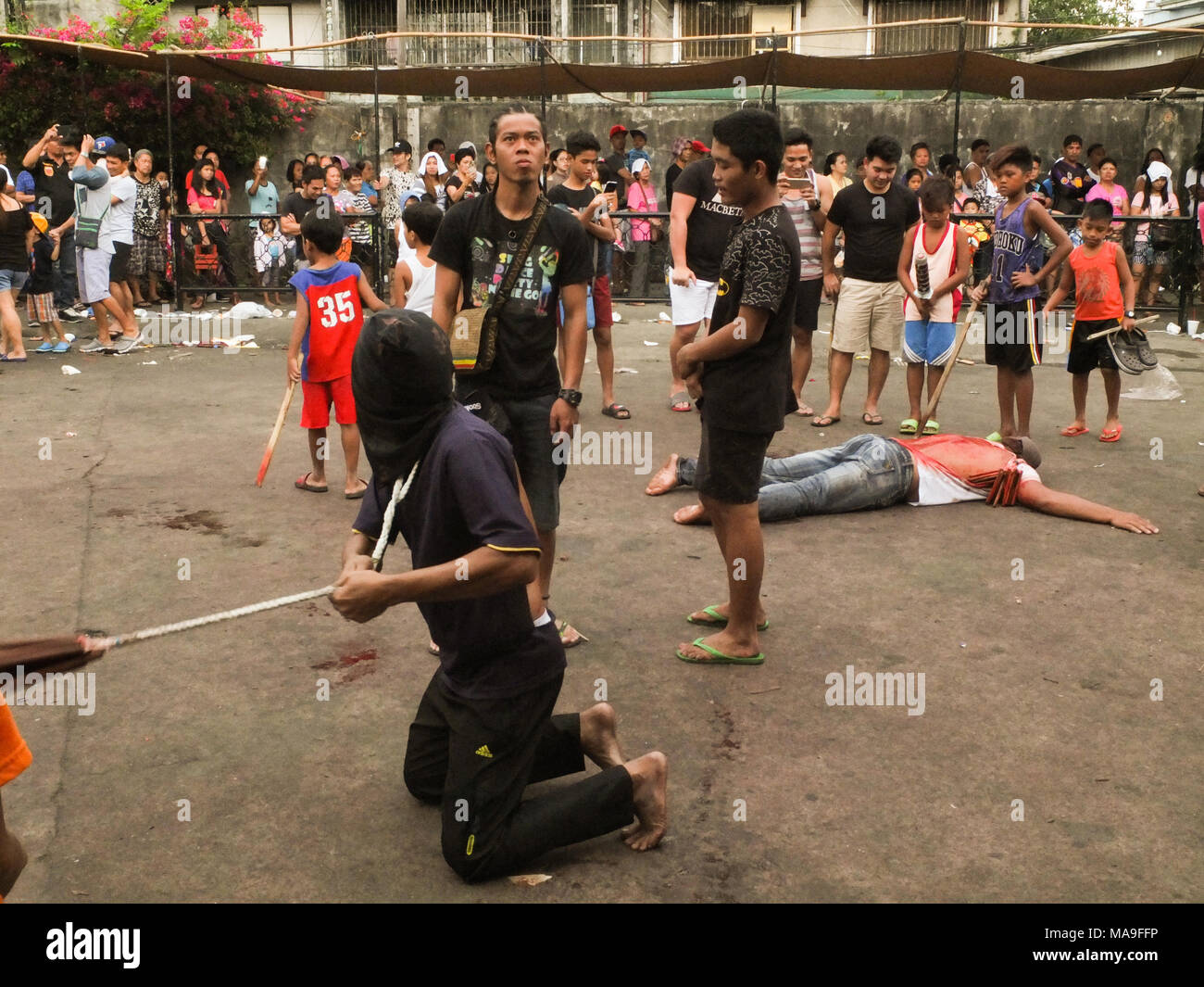 Self crucifixion hi-res stock photography and images - Alamy