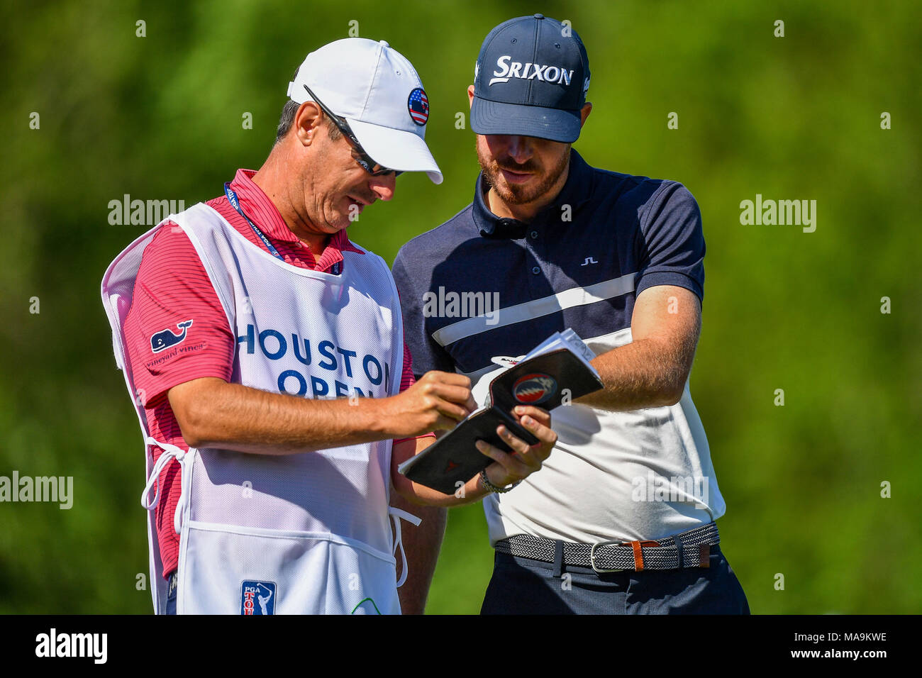Humble, Texas, USA. 30th Mar, 2018. Sam Ryder and his caddie talk ...