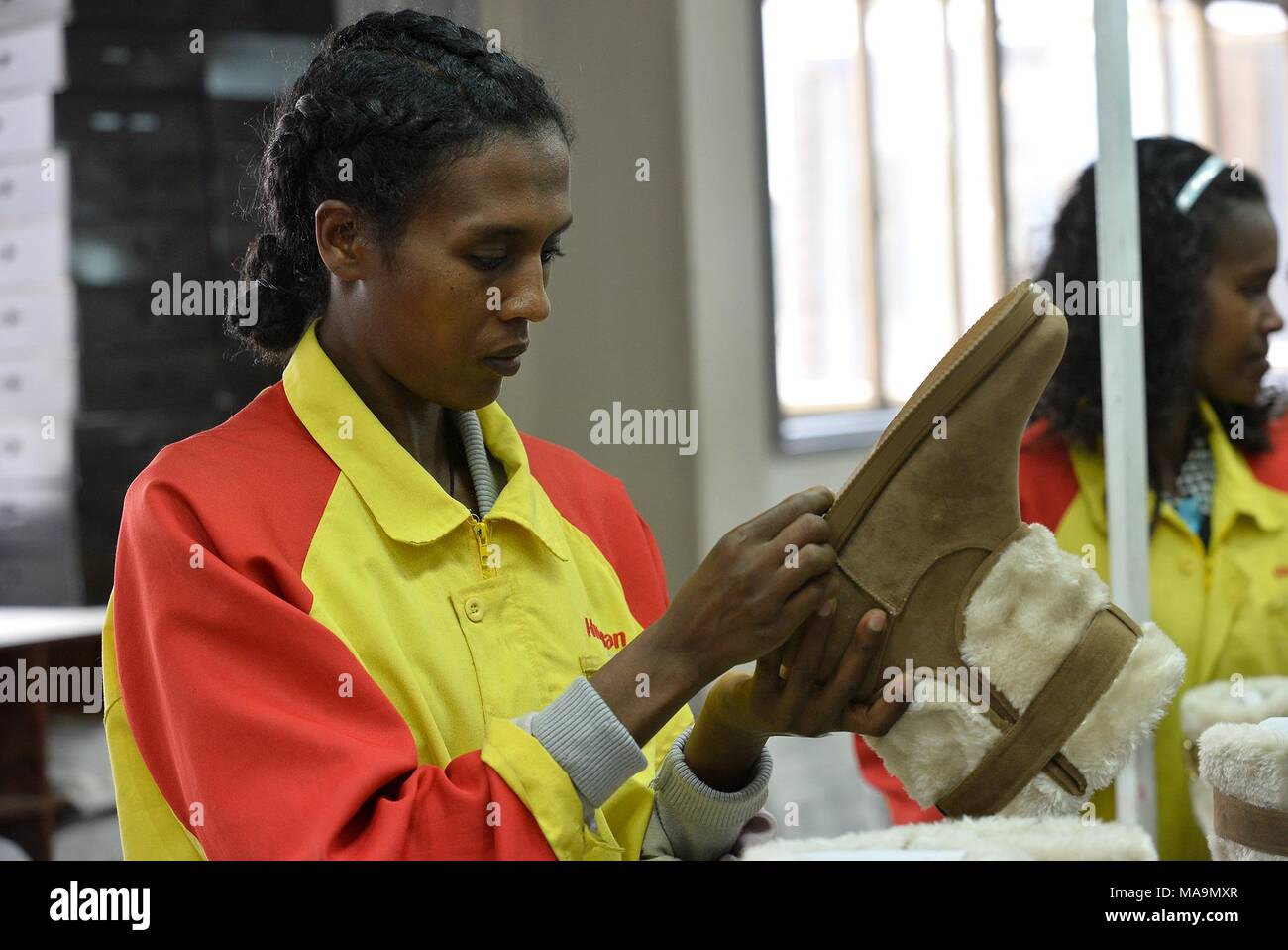 Beijing, Ethiopia. 19th July, 2017. A laborer works at Huajian factory ...