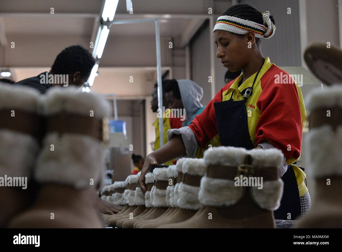 Beijing, Ethiopia. 19th July, 2017. A laborer works at Huajian factory ...