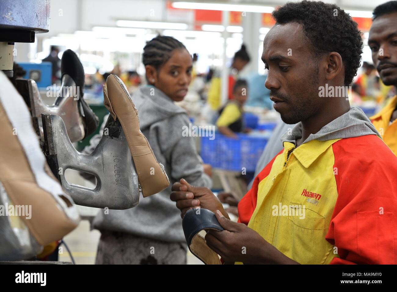 Beijing, Ethiopia. 19th July, 2017. A laborer works at Huajian factory ...