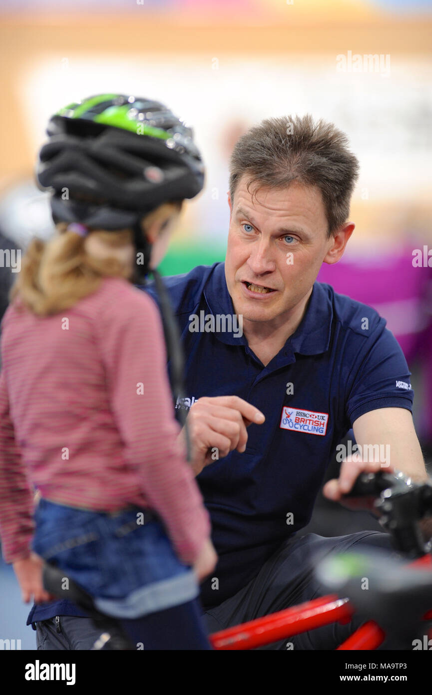 London, UK, 31 Mar 2018. A British Cycling instructor teaching kids to ...