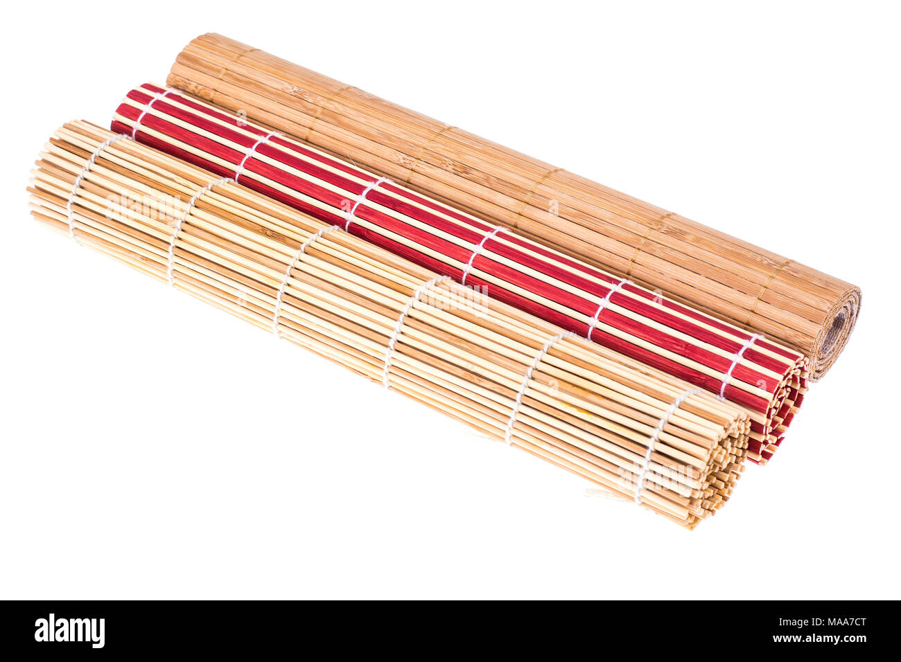 Bamboo mats of different colors on white background. Studio Photo Stock ...