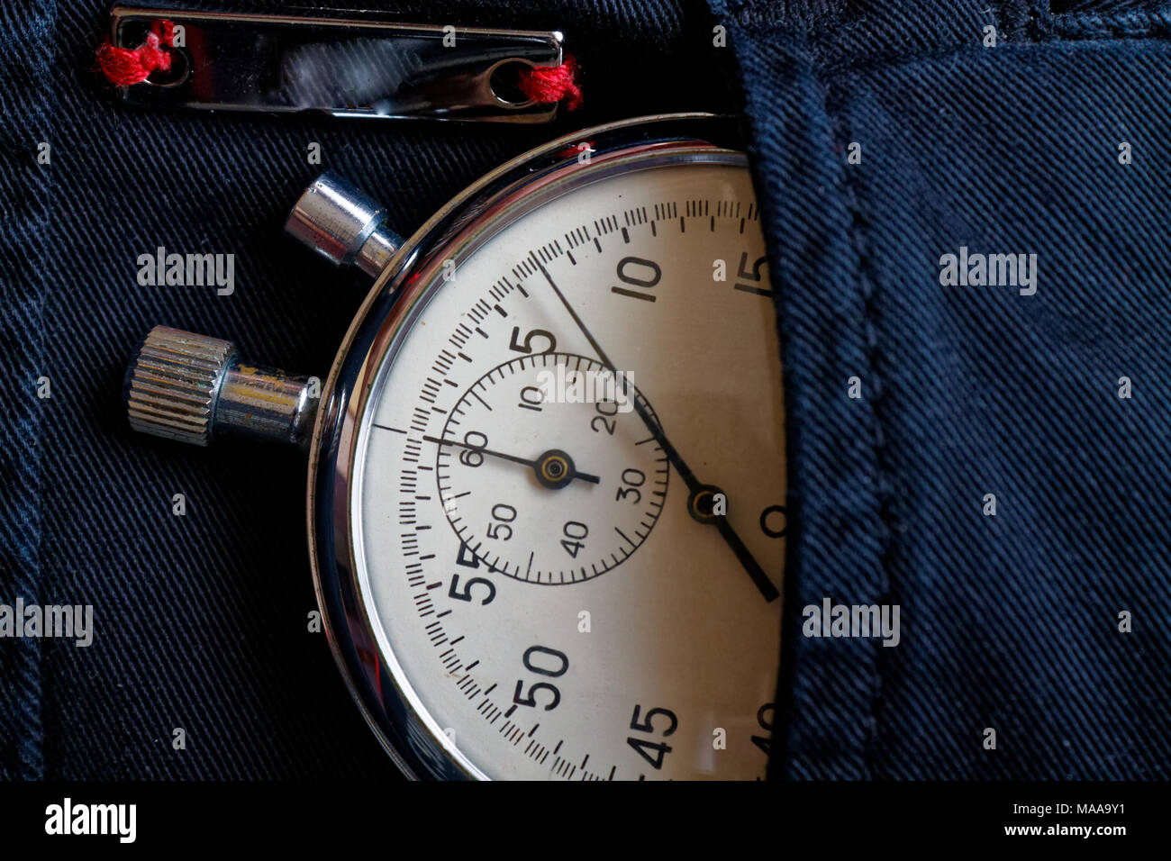 Vintage antiques Stopwatch, in black denim pocket with reflection plank ...