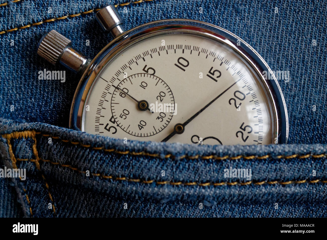 Vintage antiques Stopwatch, in old dark blue jeans pocket, value ...