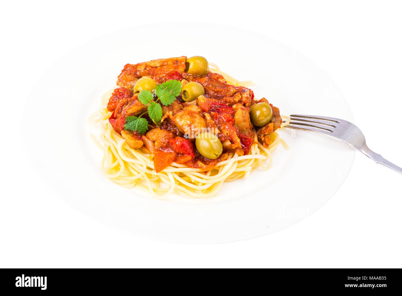 Spaghetti, chicken fillet with vegetables and olives. Studio Photo ...