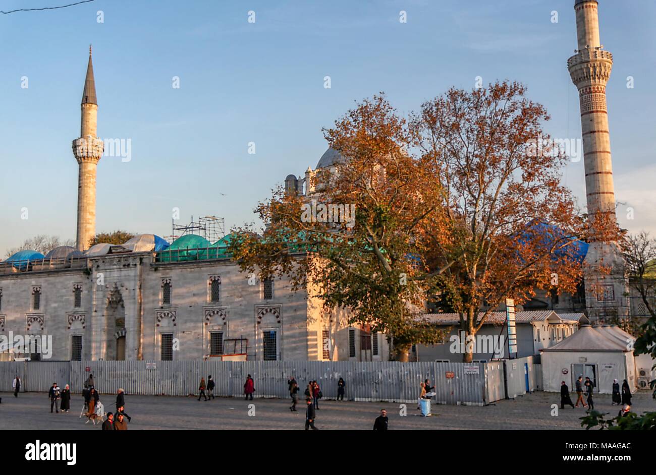 Front view of the fenced Beyazit Mosque on the crowded Beyazit Square ...