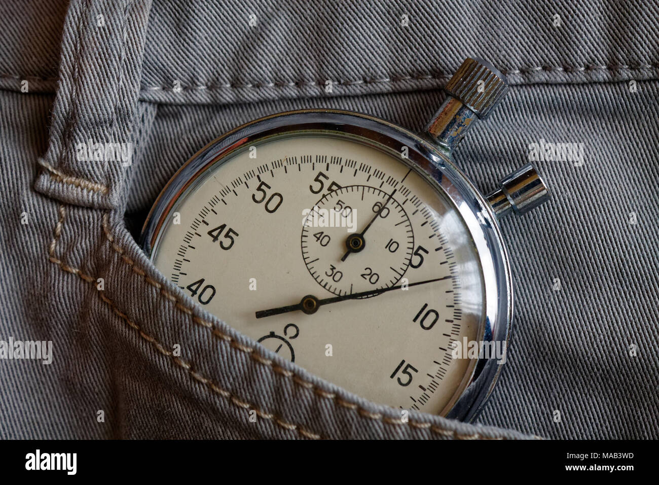 Vintage antiques Stopwatch, in white denim pocket, value measure time ...