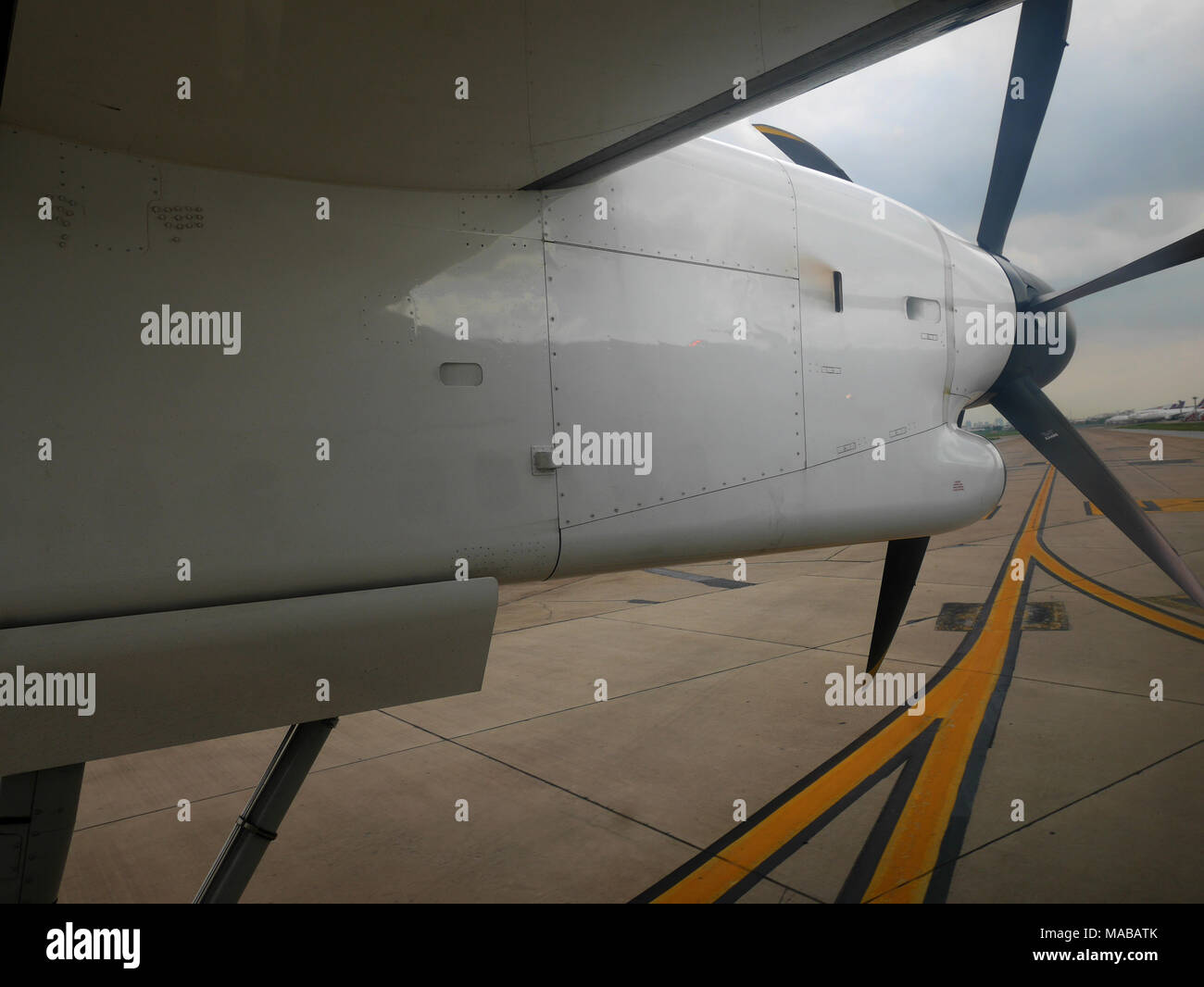 Airbus twin propeller running on runway for take off at Don Mueang ...