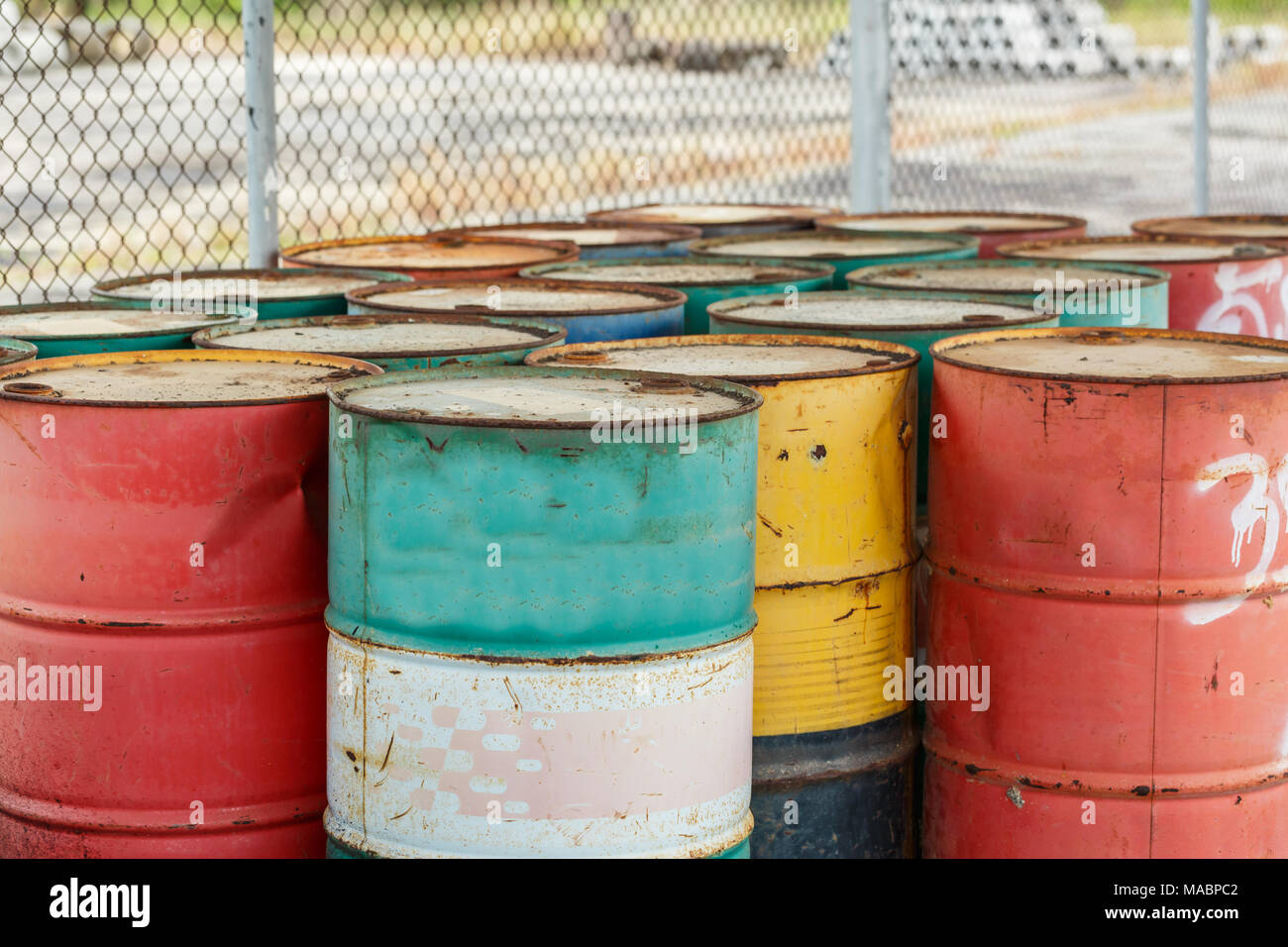petrol garbage in rusty tank discard form factory Stock Photo - Alamy
