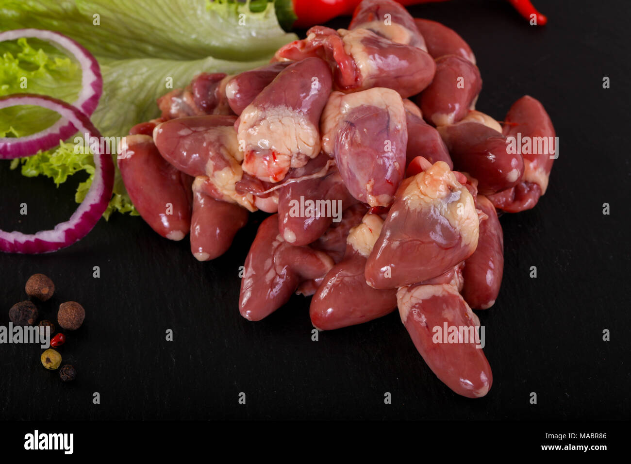 Raw chicken hearts for cooking Stock Photo - Alamy