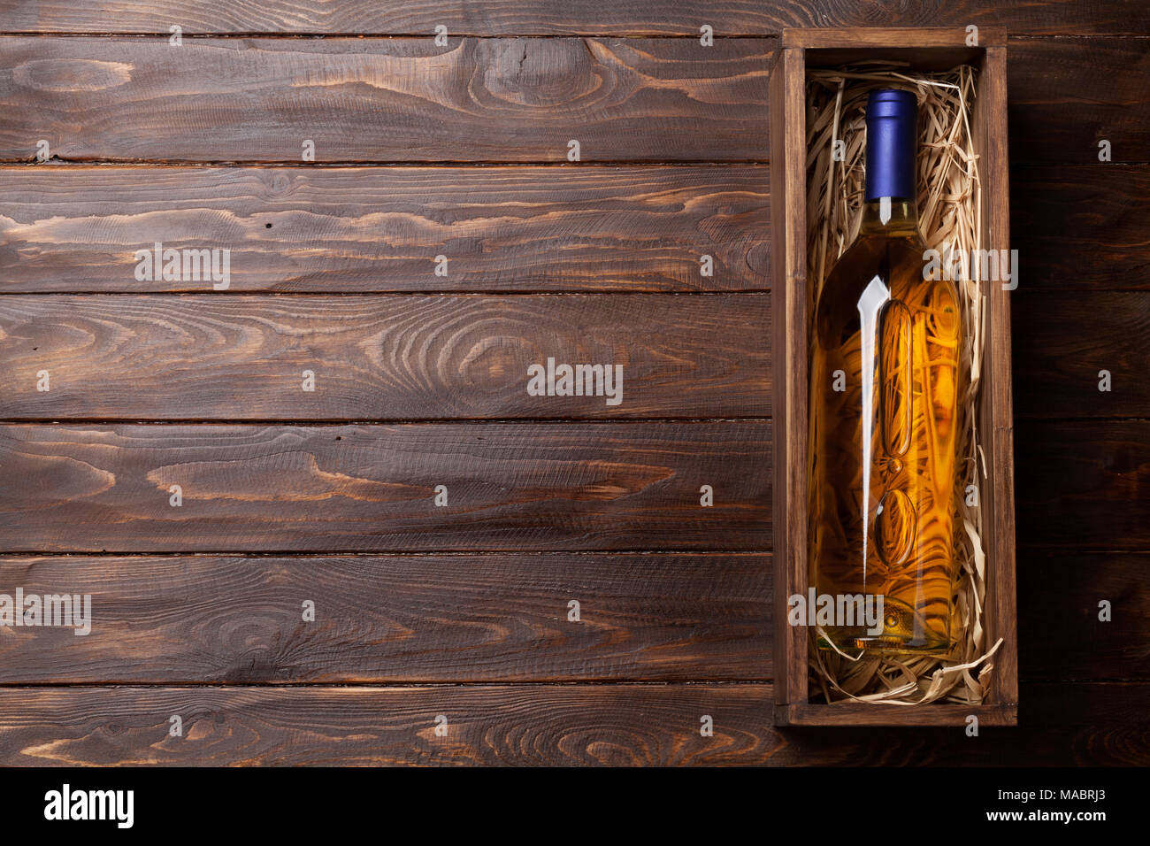 White wine bottle in box. Top view with space for your text Stock Photo ...