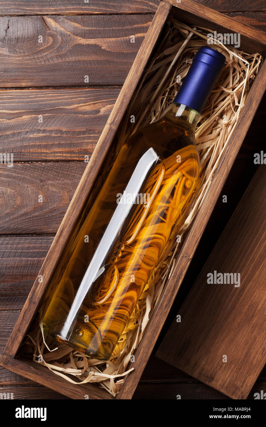 White wine bottle in box. Top view with space for your text Stock Photo ...