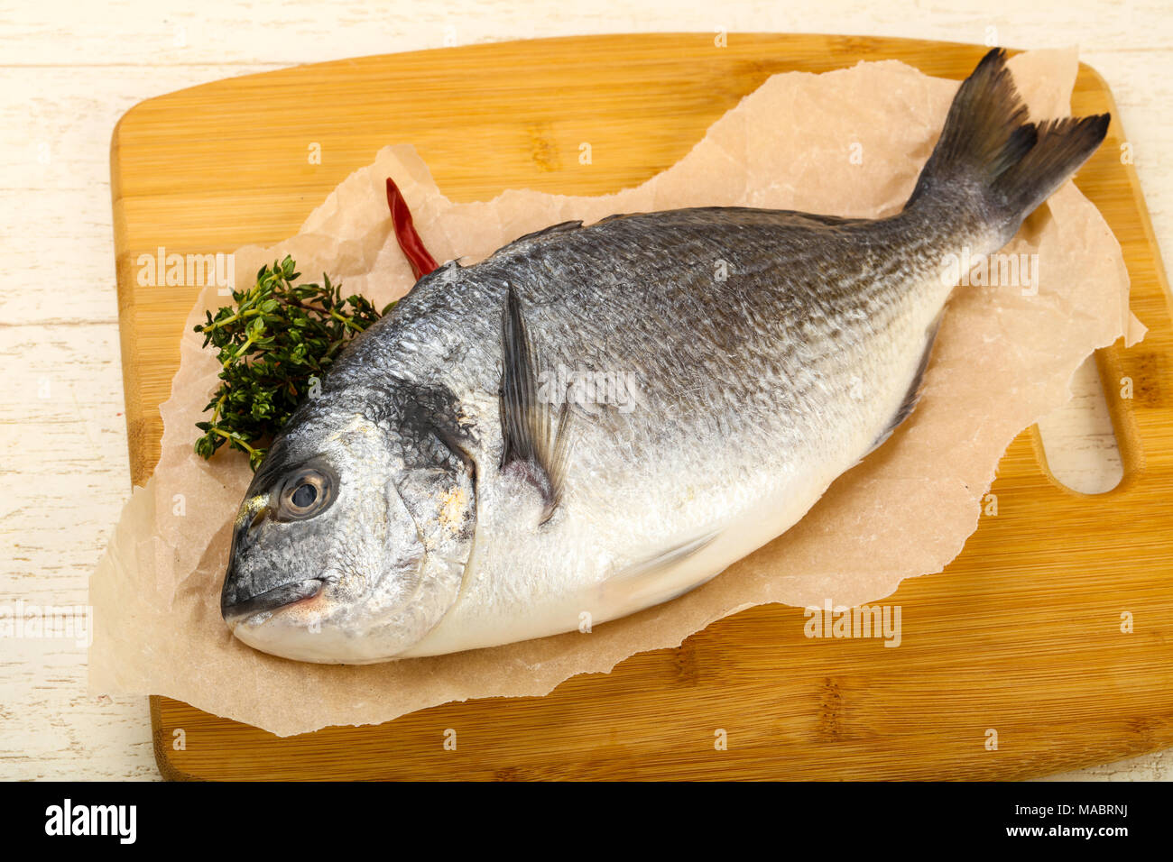 raw dorada fish - ready for cooking Stock Photo - Alamy