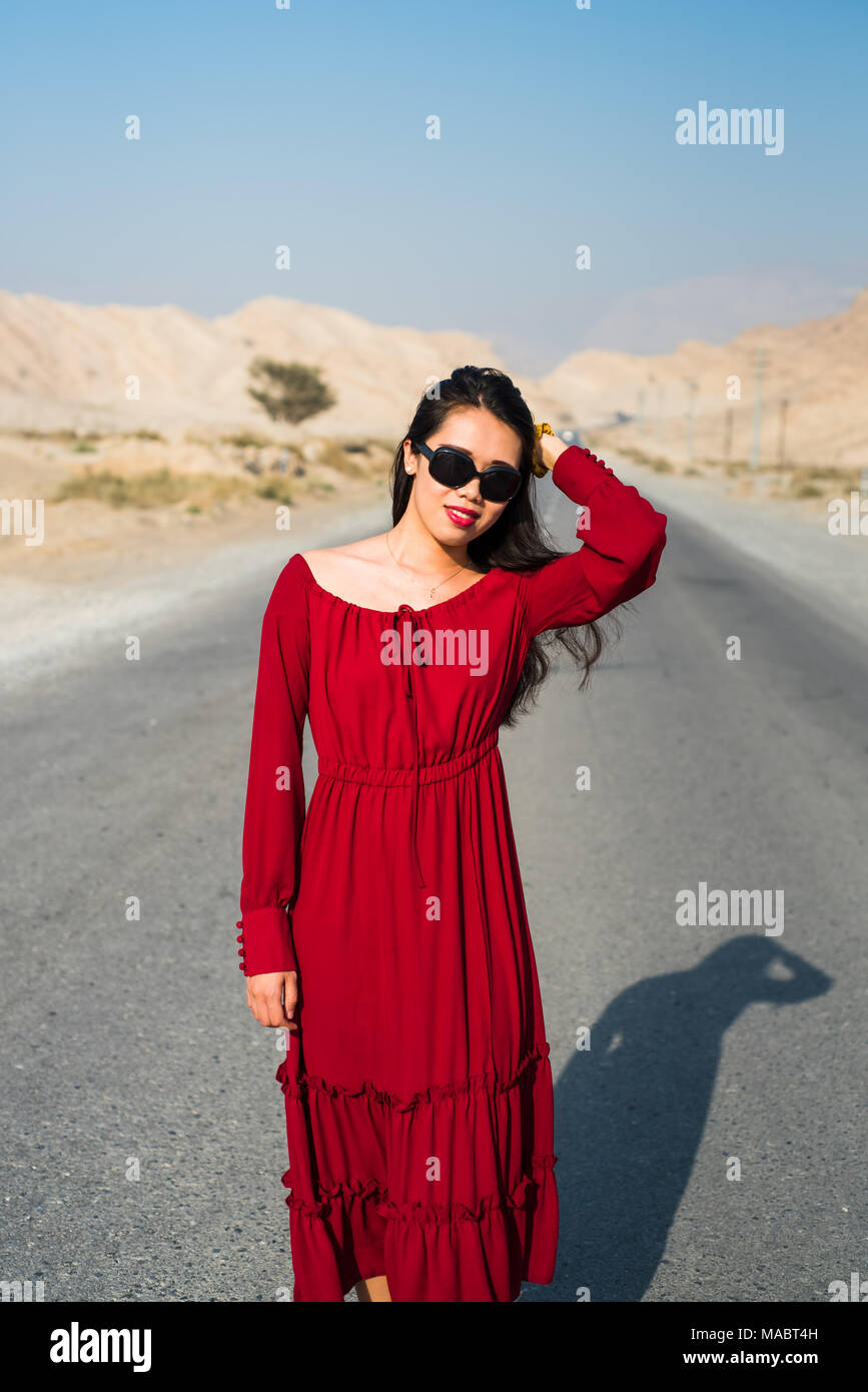 Beautiful woman red backpack walking hi-res stock photography and ...