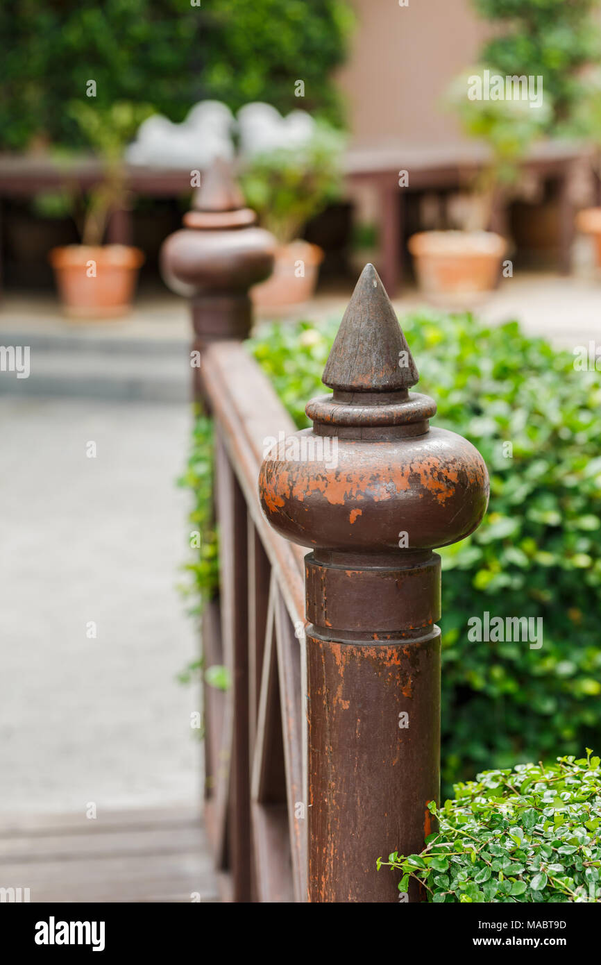 wooden railing on a decorative bridge Stock Photo - Alamy