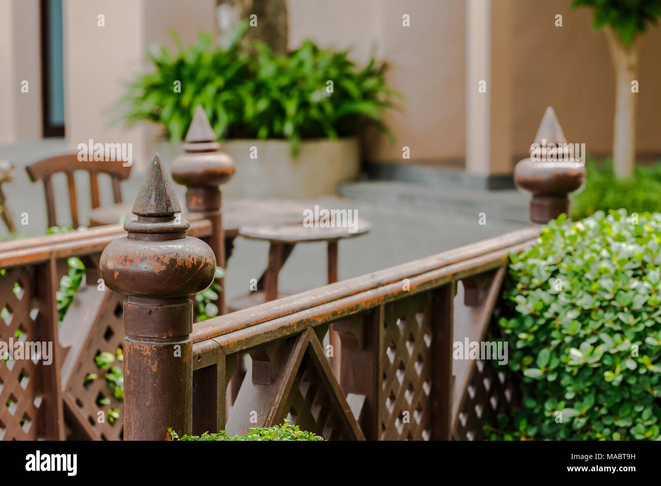wooden railing on a decorative bridge Stock Photo - Alamy