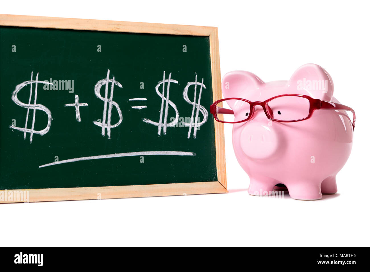 Pink piggy bank with glasses standing next to a blackboard with simple ...