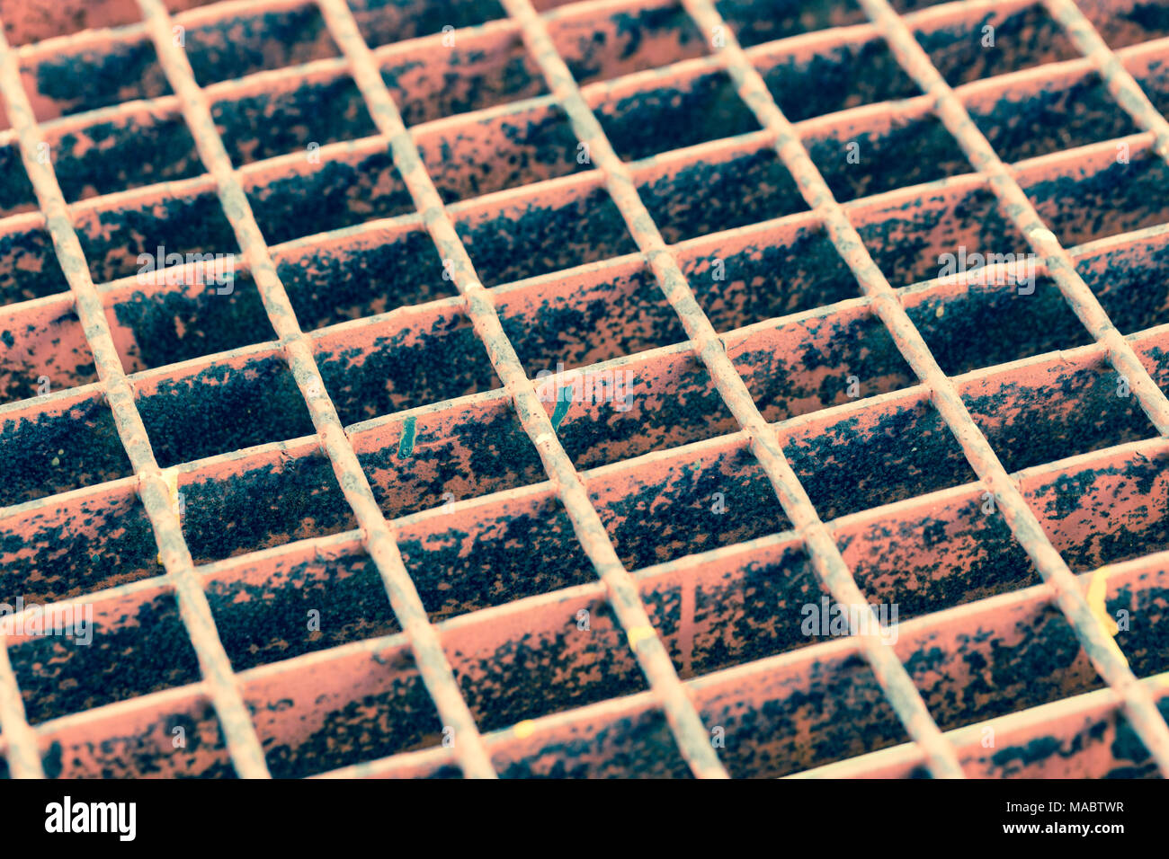 Close up Rust steel grating of drain cover Stock Photo - Alamy
