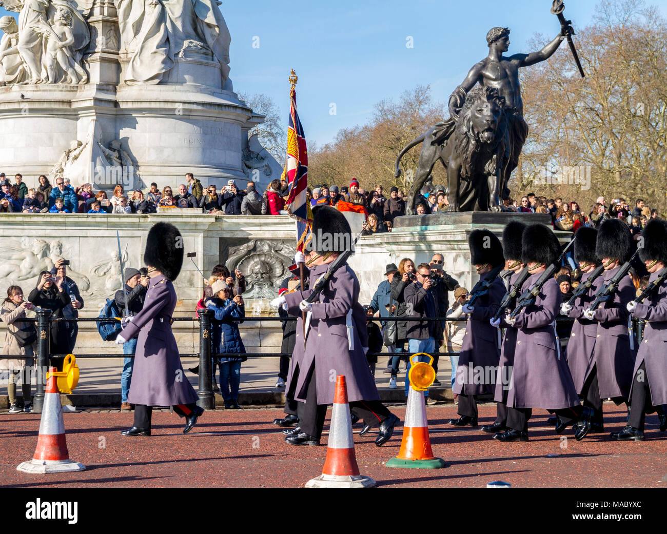 Crowds gathered watching the Queens Guard, Royal Guards in their Winter ...