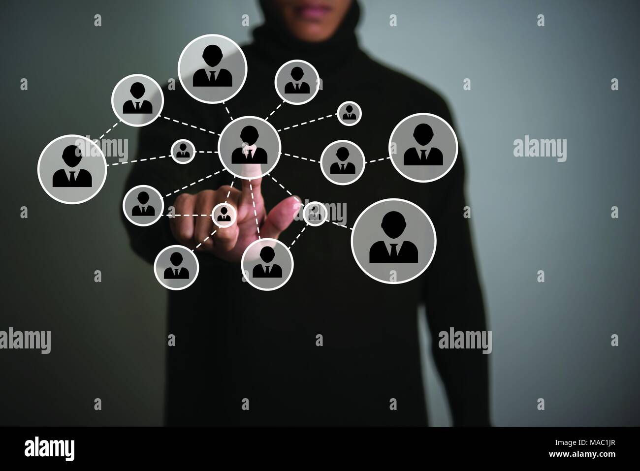 Businessman pressing people icon network button on modern digital ...