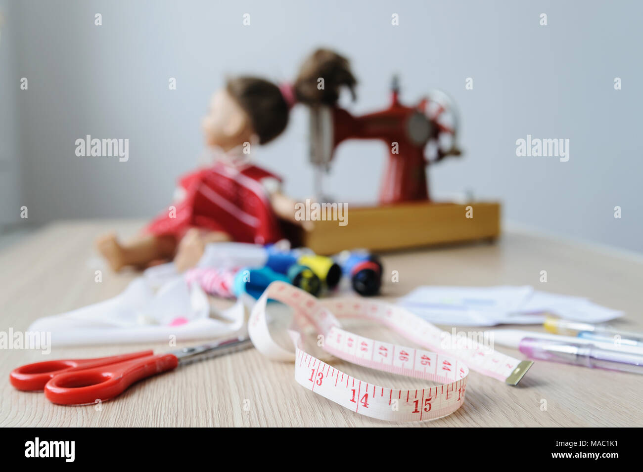 Girl measuring doll hi-res stock photography and images - Alamy