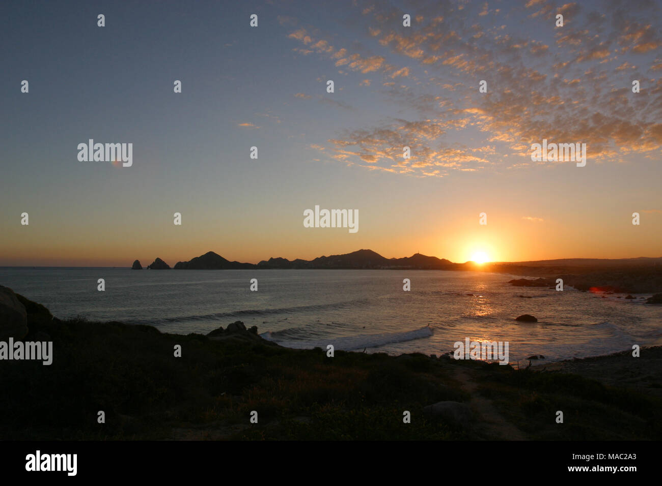 sunset over cabo san lucas Stock Photo - Alamy