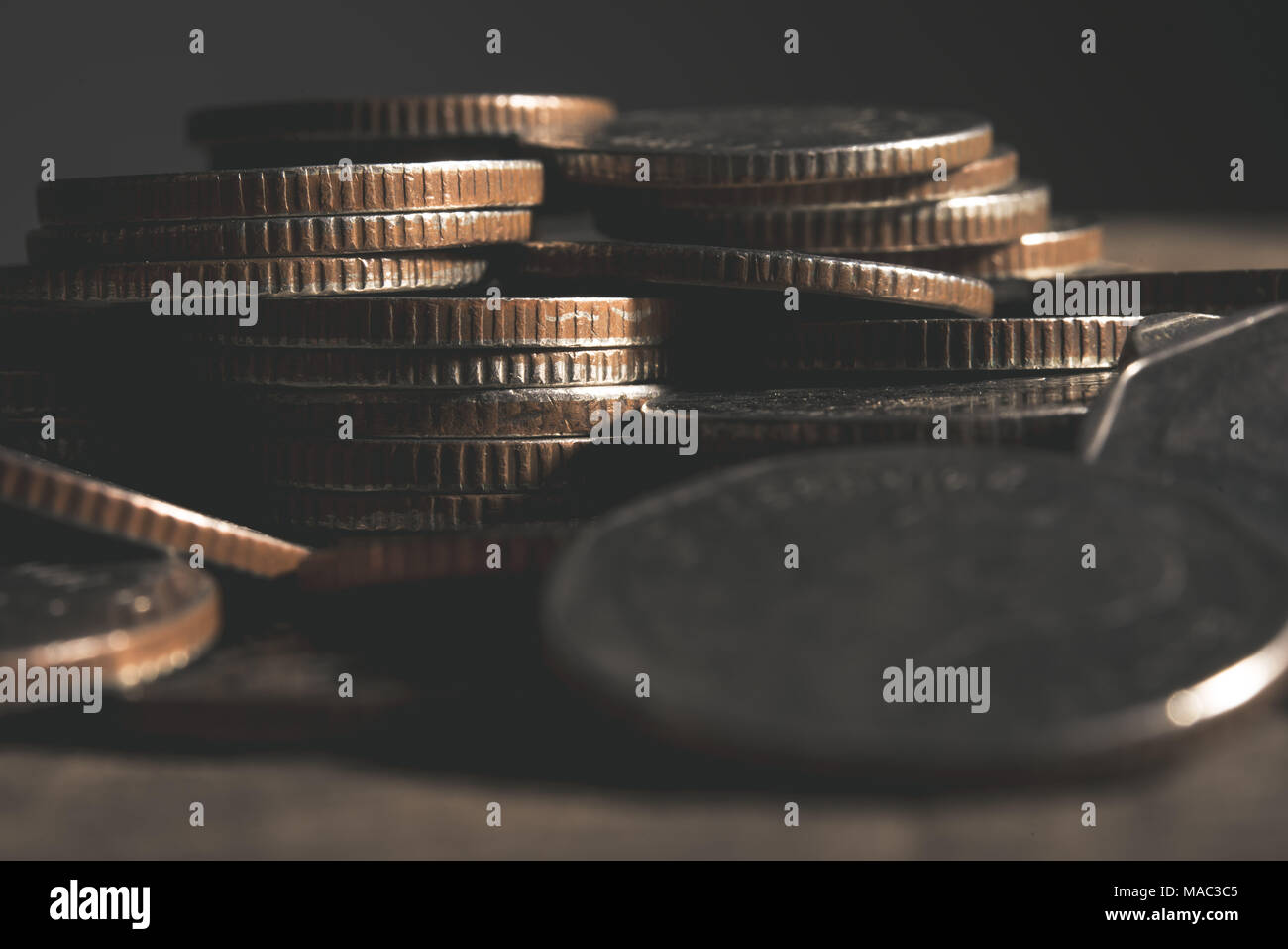 Stacks of coins in the form of a ladder isolated on white background ...