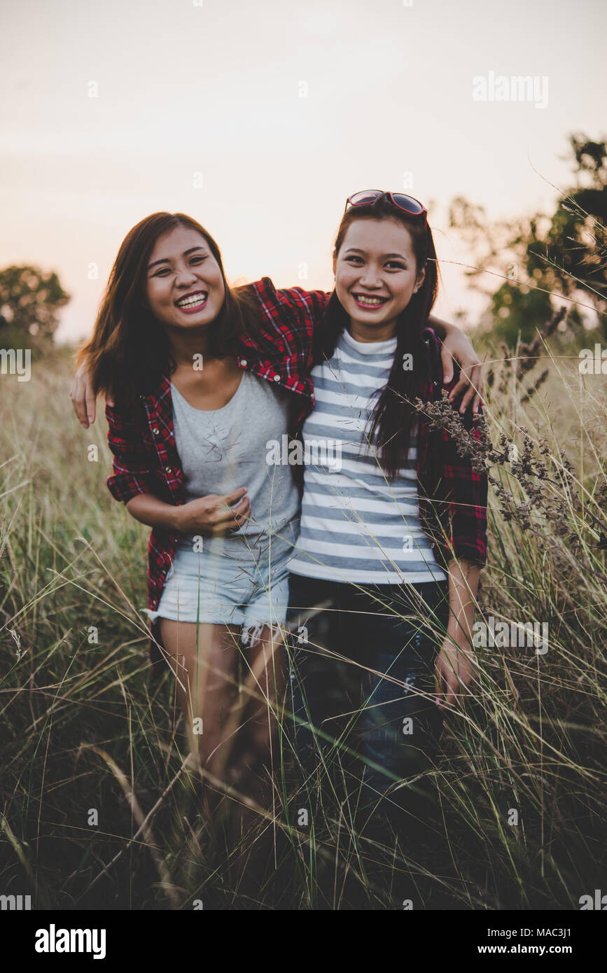 Two best friends hugging and looking at the camera. Freedom enjoy ...