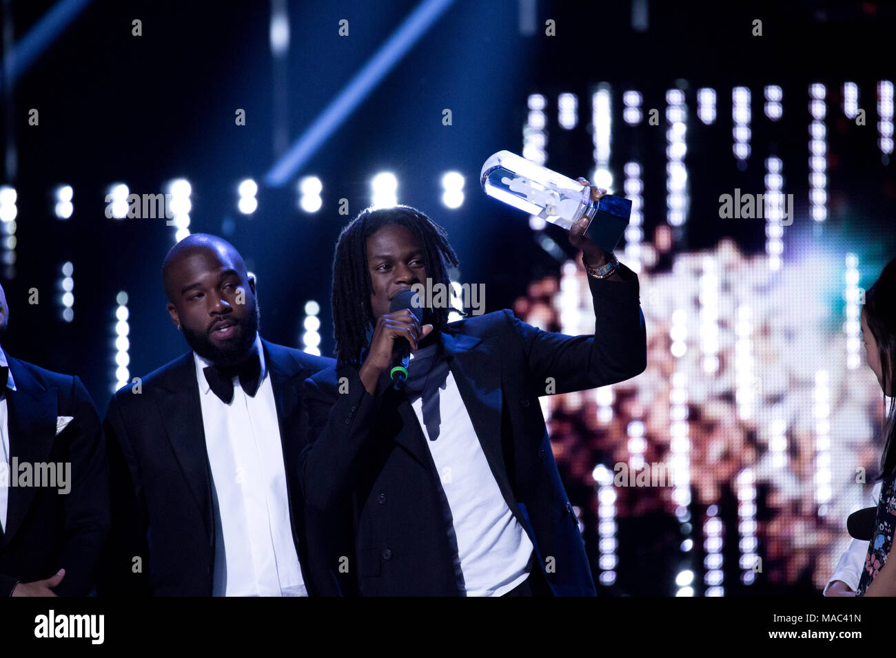 Vancouver, CANADA. 26th March, 2018. Daniel Caeser accepts the "R&B ...