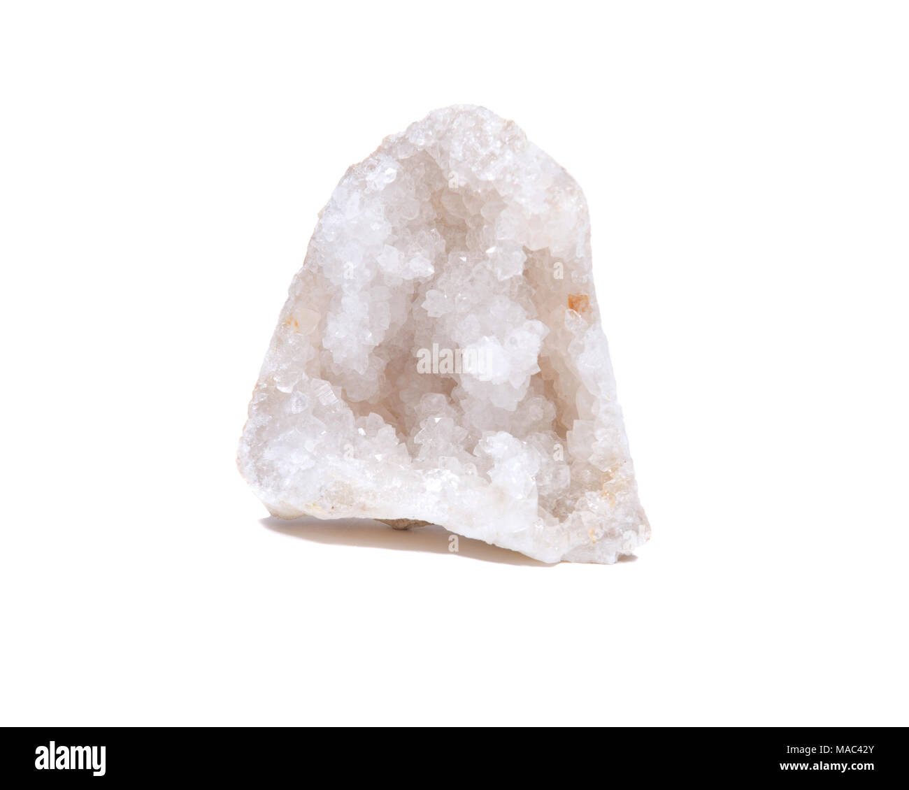 Clear crystal quartz geode with crystalline druzy center isolated on ...