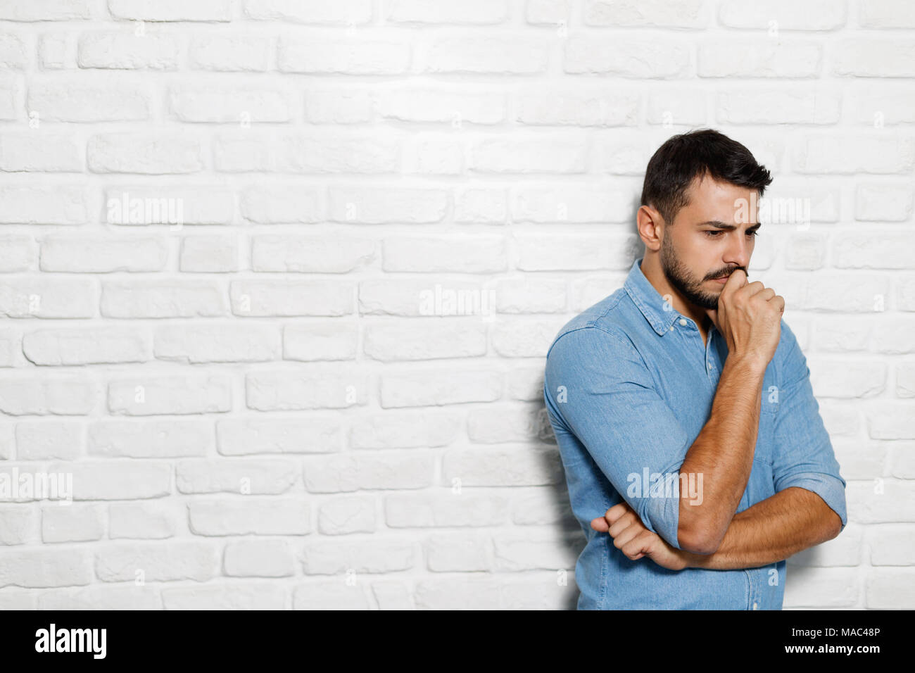 Portrait of puzzled man having doubts. Doubtful Italian business man ...
