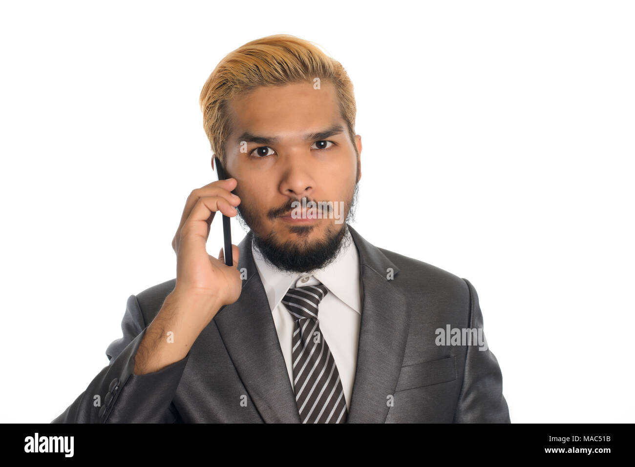Handsome businessman use mobile phone isolated on white background ...
