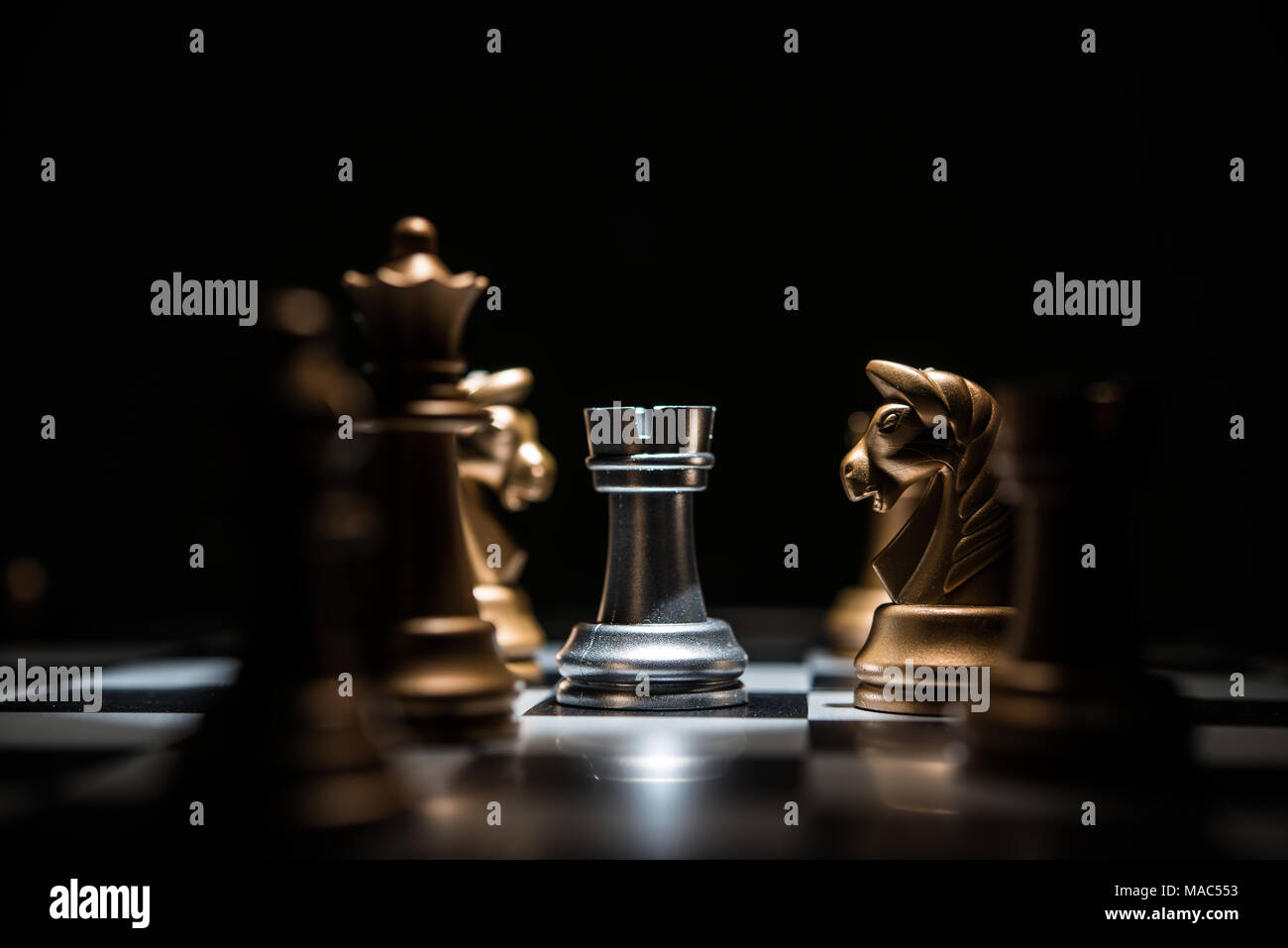 Chess battle defeat pawn of silver team Stock Photo - Alamy