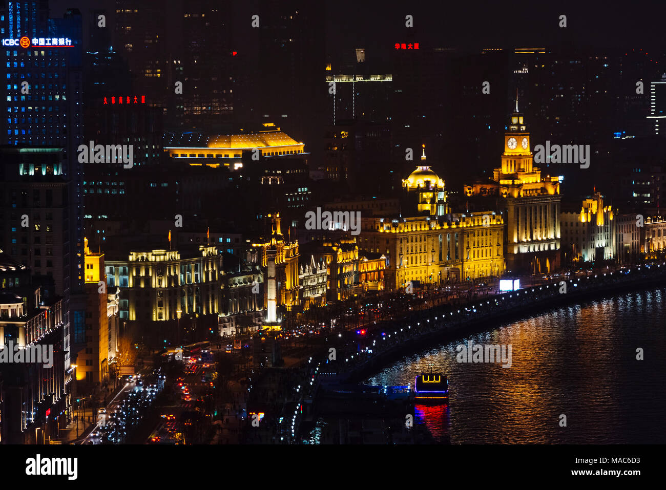 Night view of colonial buildings along the Bund by Huangpu River ...
